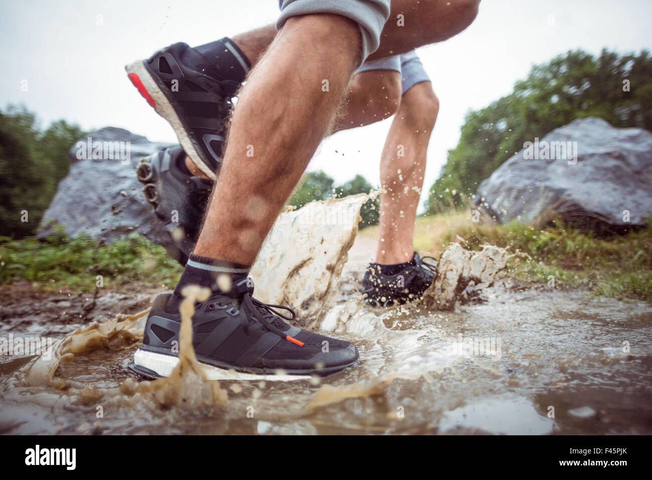 Splash puddle adult hi-res stock photography and images - Alamy