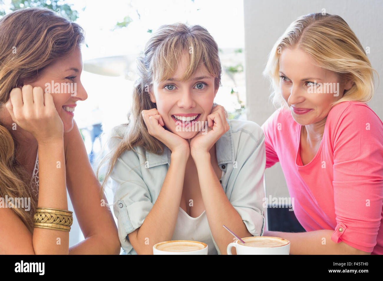 Beautiful women smiling at the camera Stock Photo - Alamy