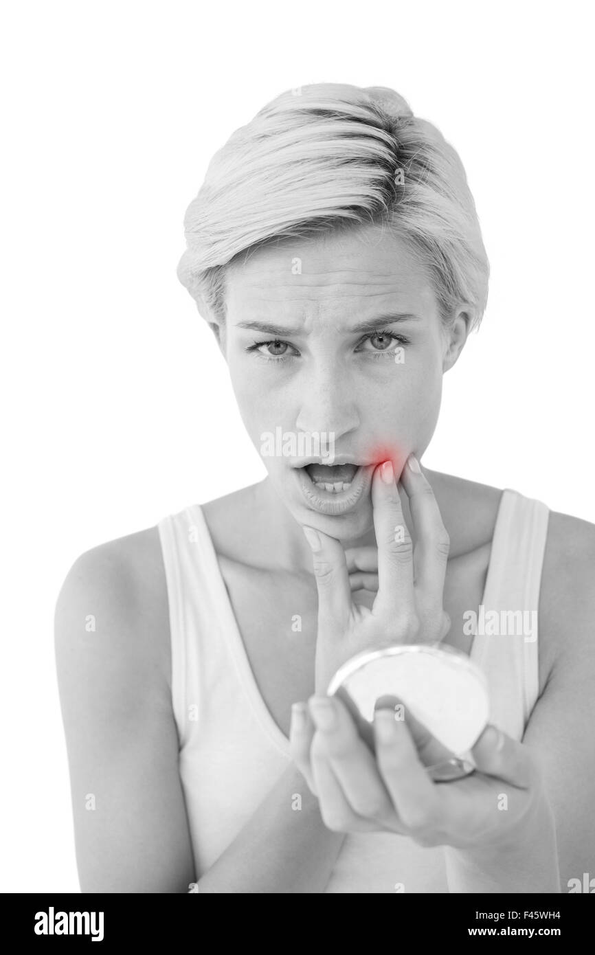 Shocking woman with mirror looking at camera Stock Photo - Alamy