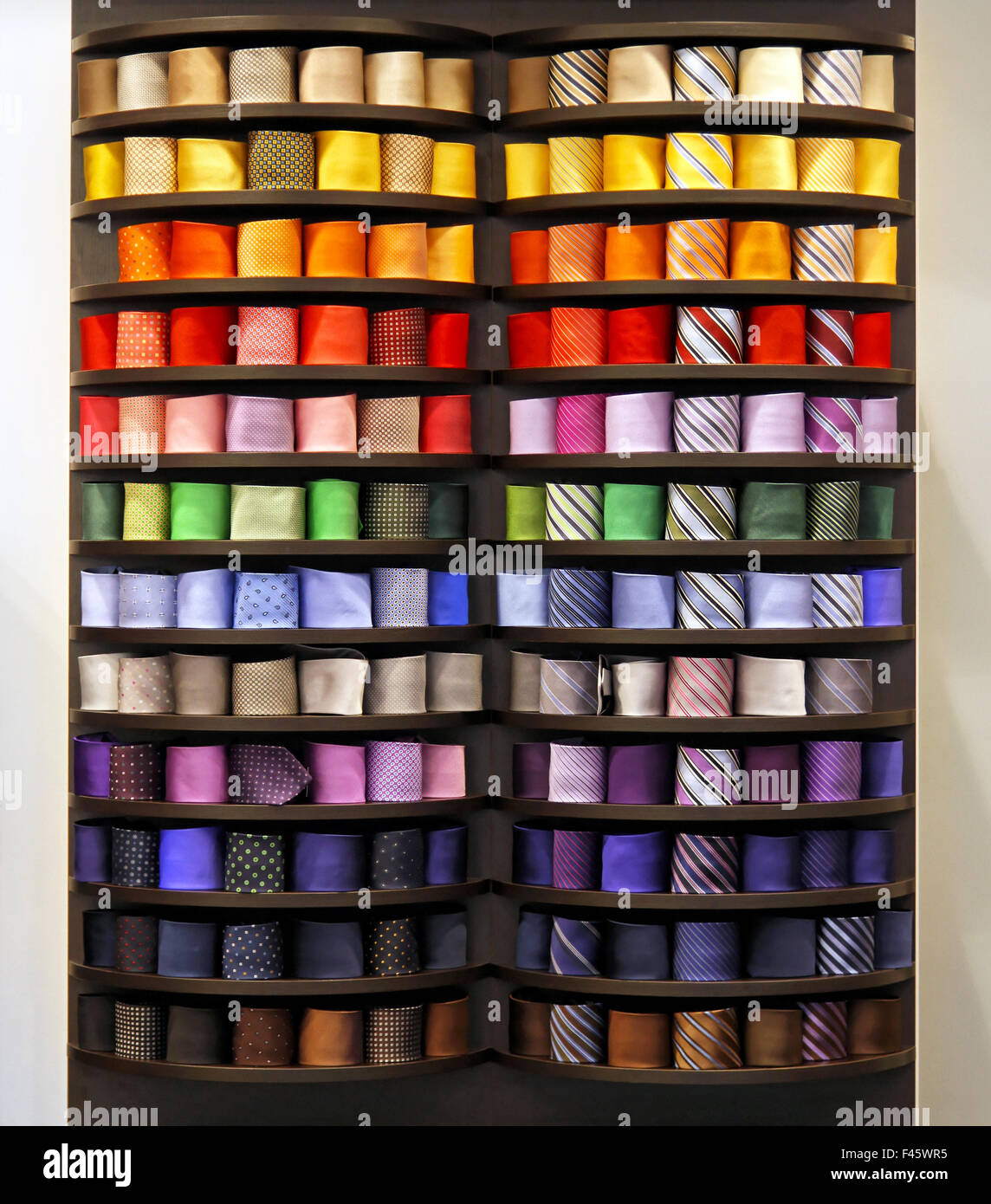 Big collection of colorful ties in shelf Stock Photo - Alamy