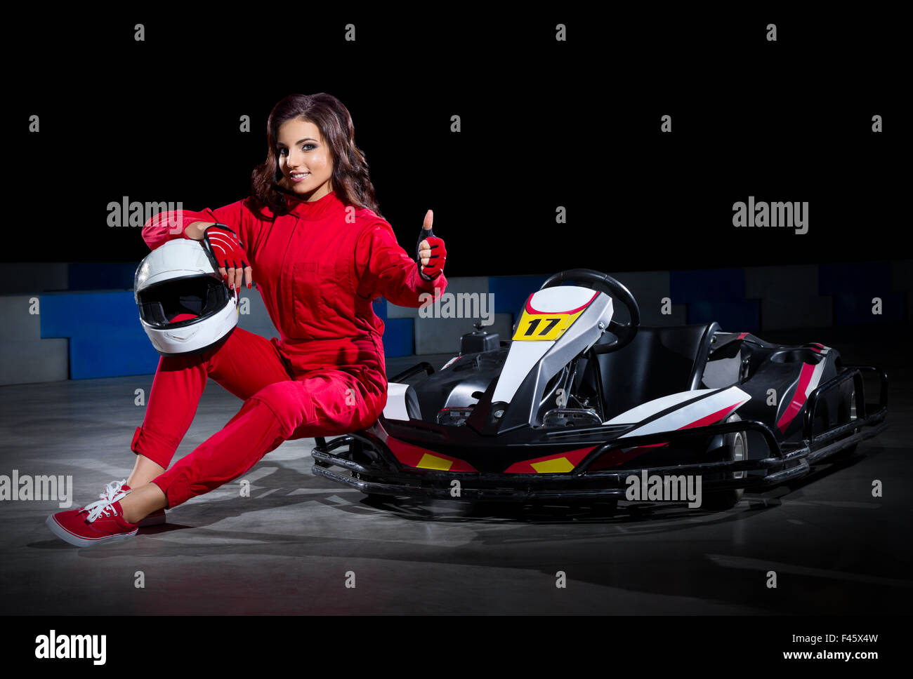 Young girl karting racer isolated Stock Photo - Alamy