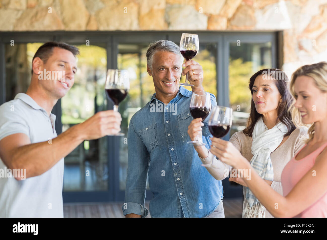 Sommelier and his customers doing wine tasting Stock Photo - Alamy