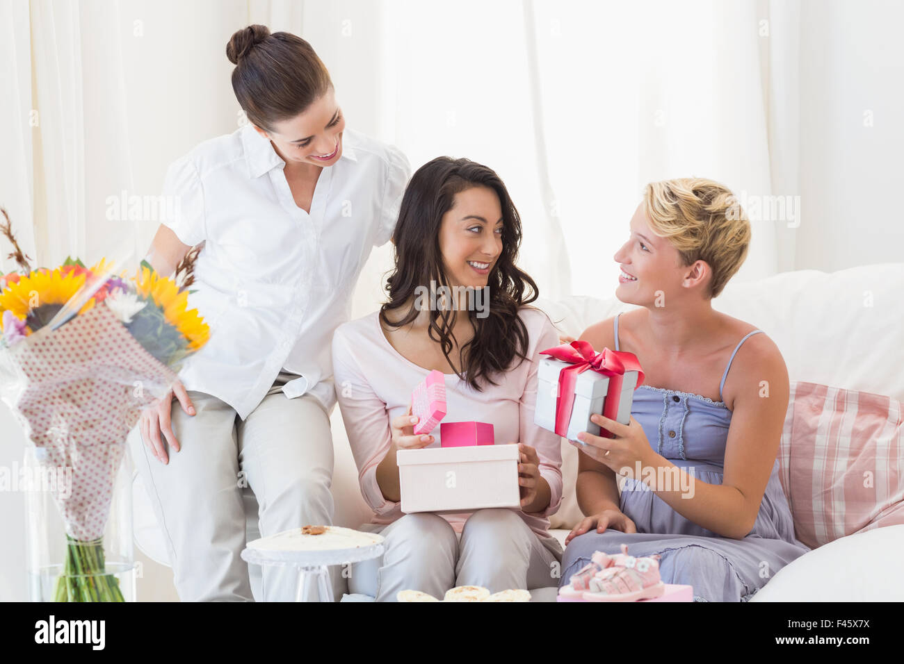 Pregnant woman receiving gift hi-res stock photography and images - Alamy