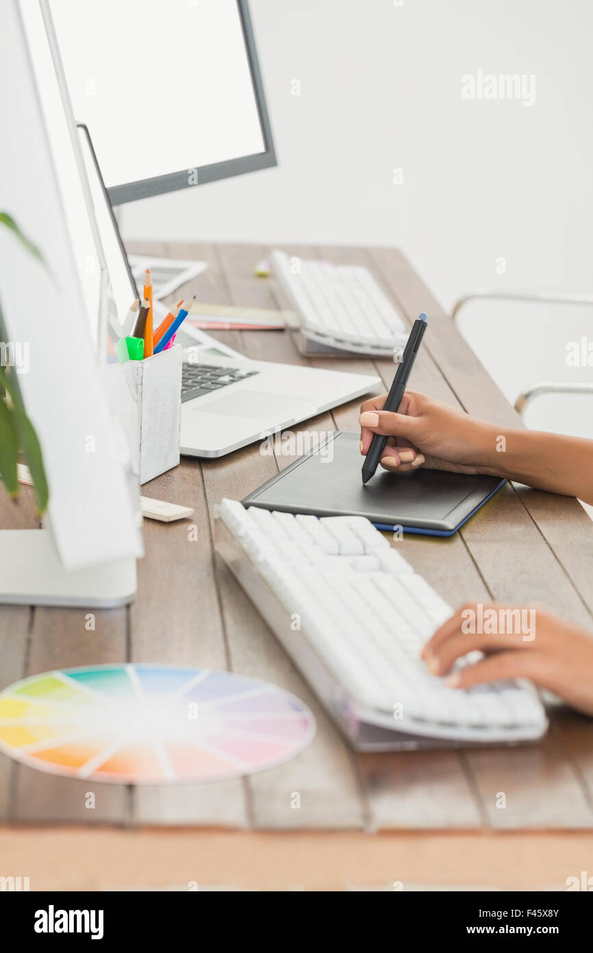 Graphic designer using a graphics tablet Stock Photo - Alamy