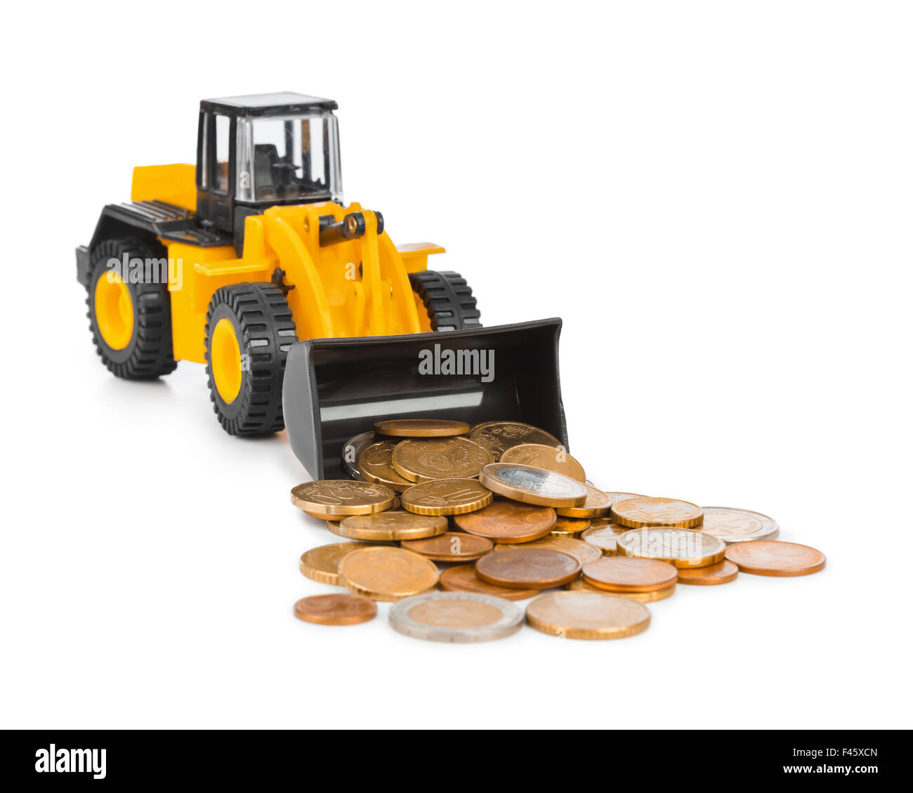 Toy loader and money coins Stock Photo - Alamy