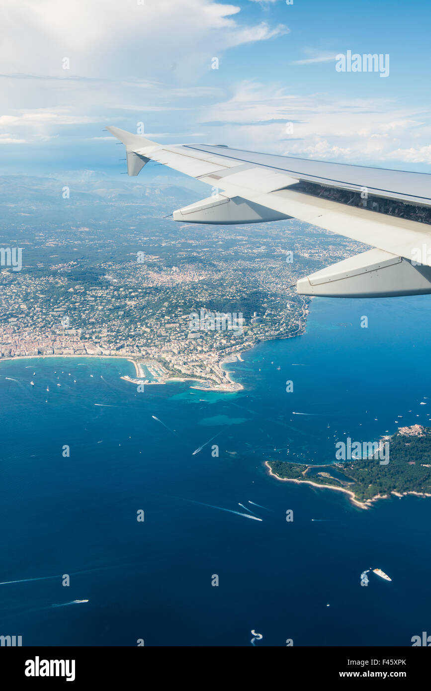 Airplane wing out of window Stock Photo - Alamy