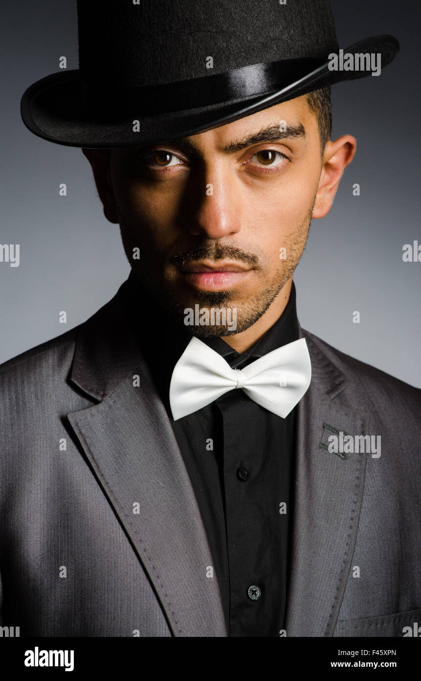 Man with hat in vintage concept Stock Photo - Alamy