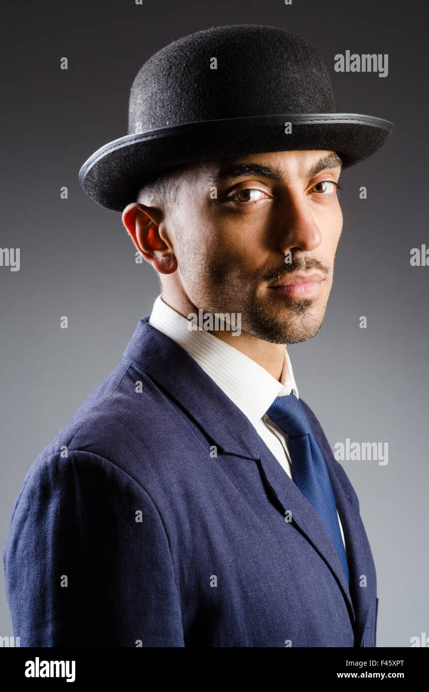 Man with hat in vintage concept Stock Photo - Alamy