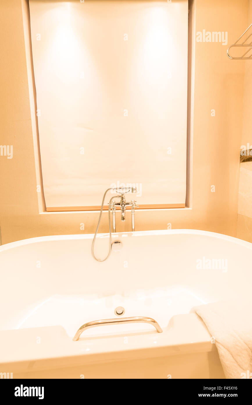 Modern bathroom interior with bathtub Stock Photo - Alamy