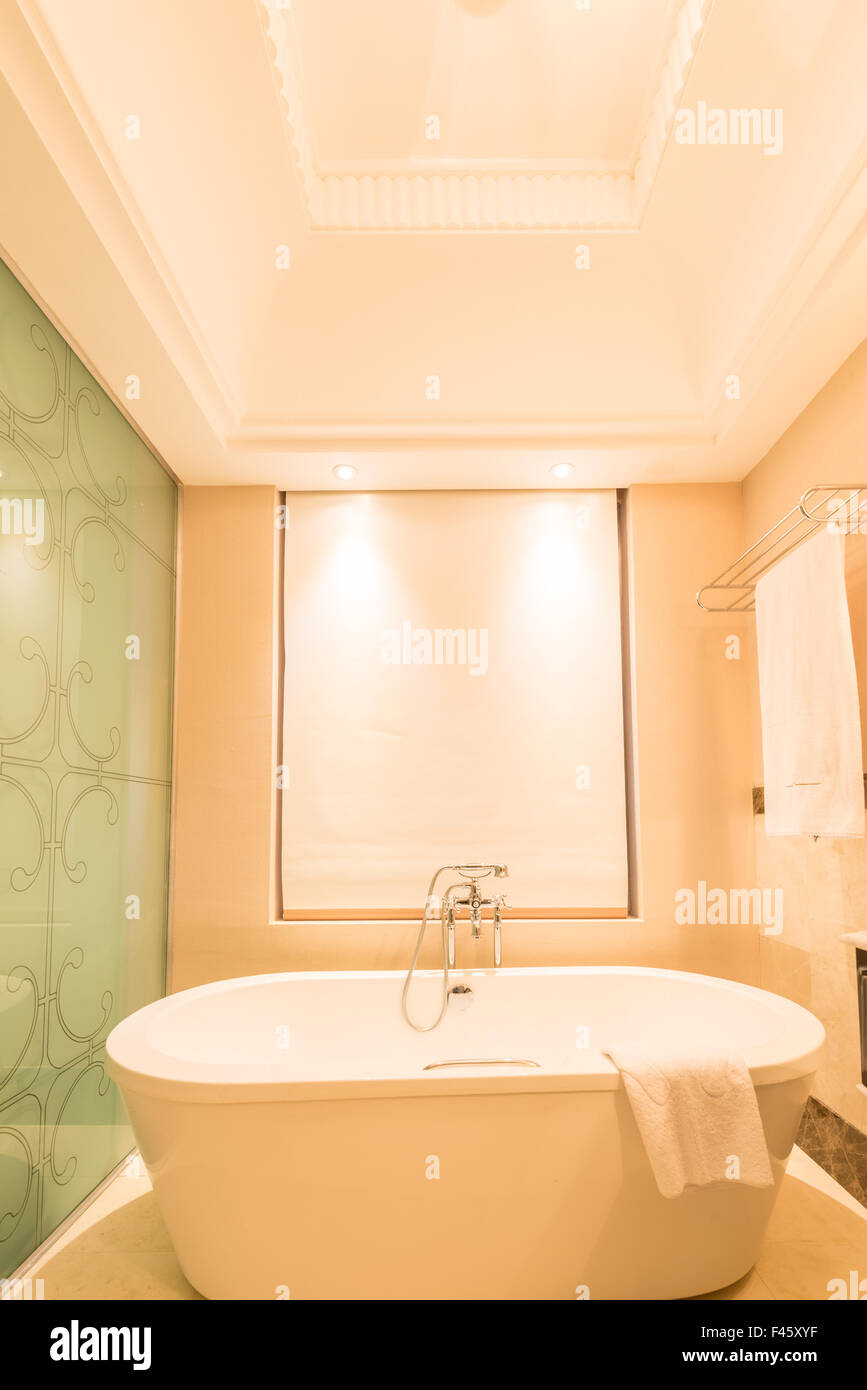 Modern bathroom interior with bathtub Stock Photo - Alamy