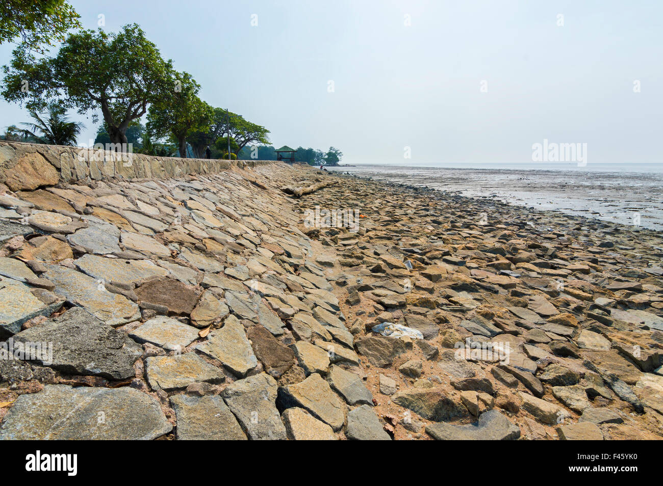 Beach stone wall Stock Photo - Alamy