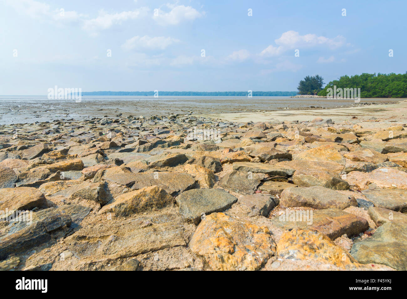 Beach stone wall Stock Photo - Alamy