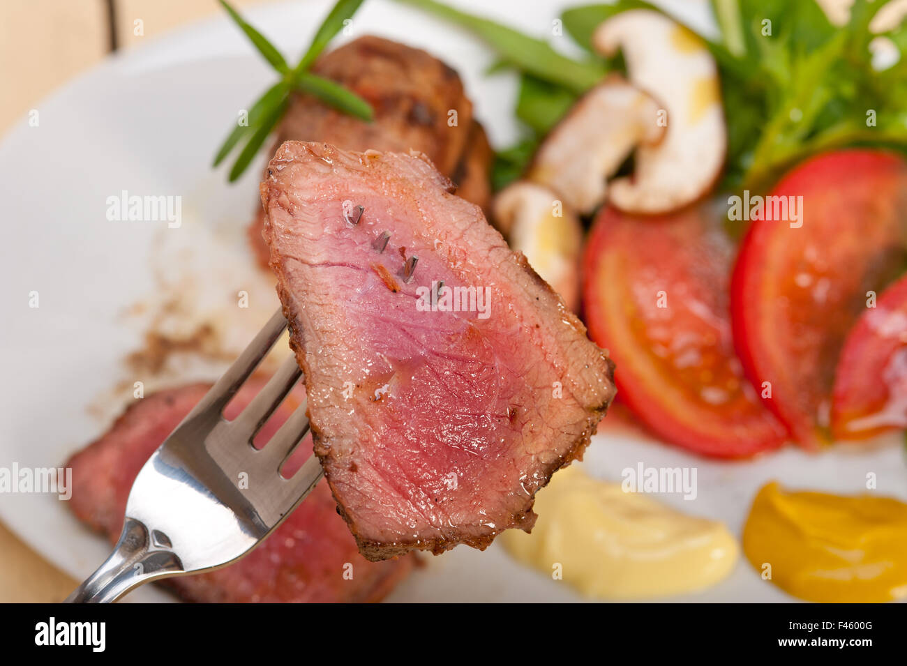 beef filet mignon grilled with vegetables Stock Photo - Alamy