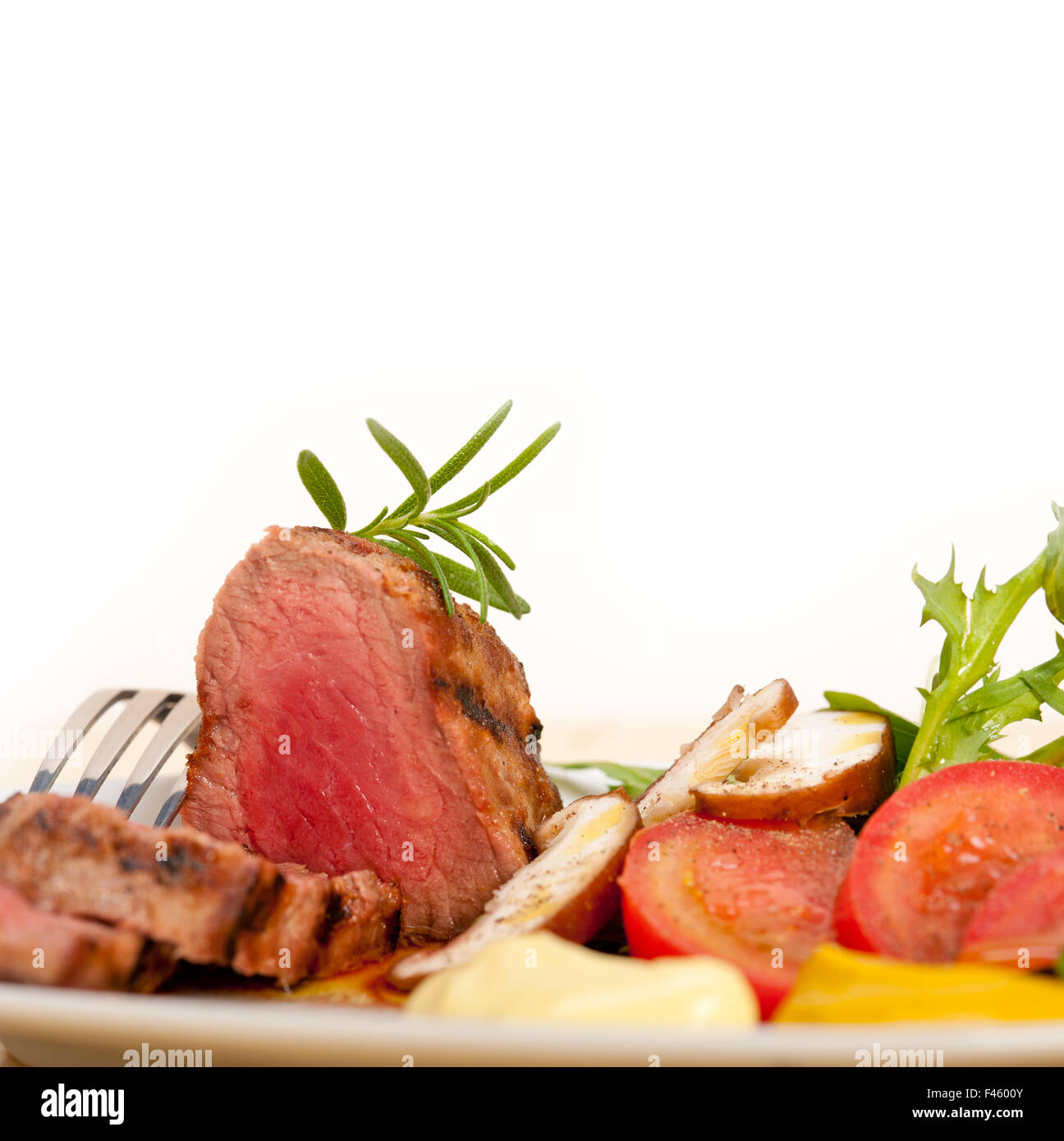 beef filet mignon grilled with vegetables Stock Photo - Alamy