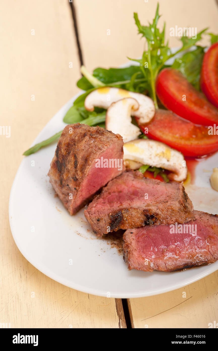 beef filet mignon grilled with vegetables Stock Photo - Alamy
