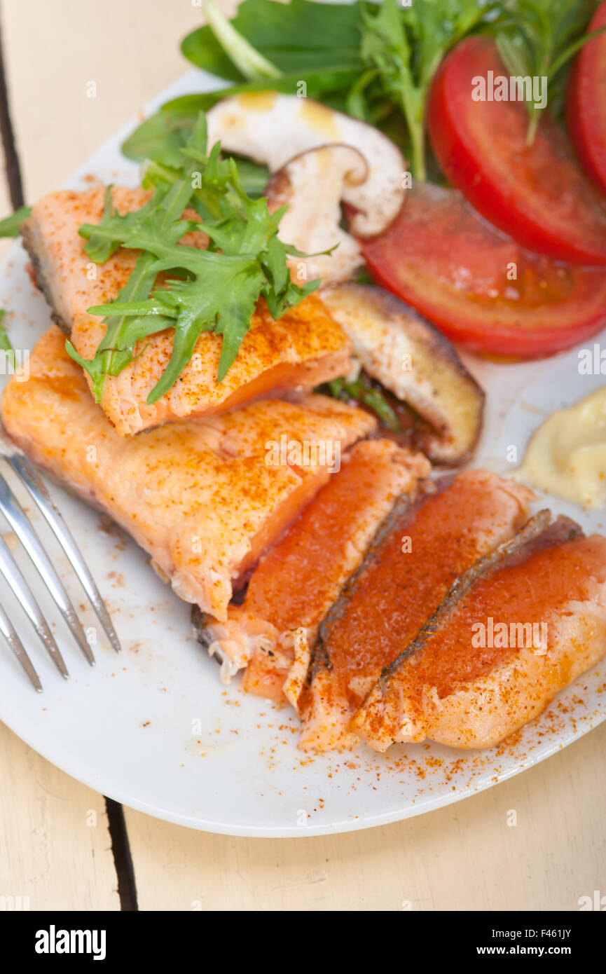 grilled samon filet with vegetables salad Stock Photo - Alamy