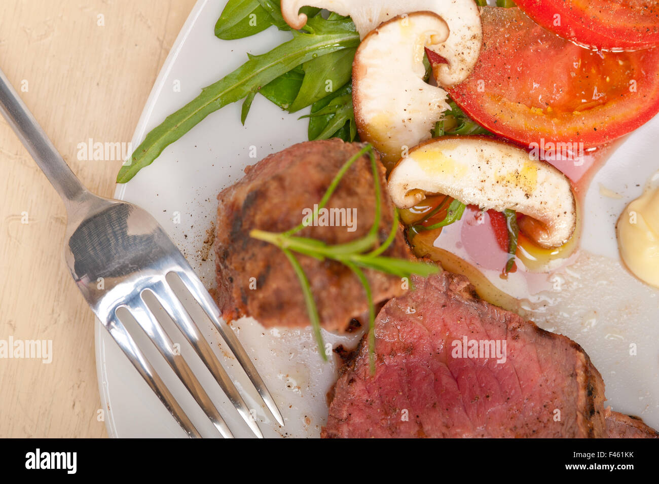 beef filet mignon grilled with vegetables Stock Photo - Alamy