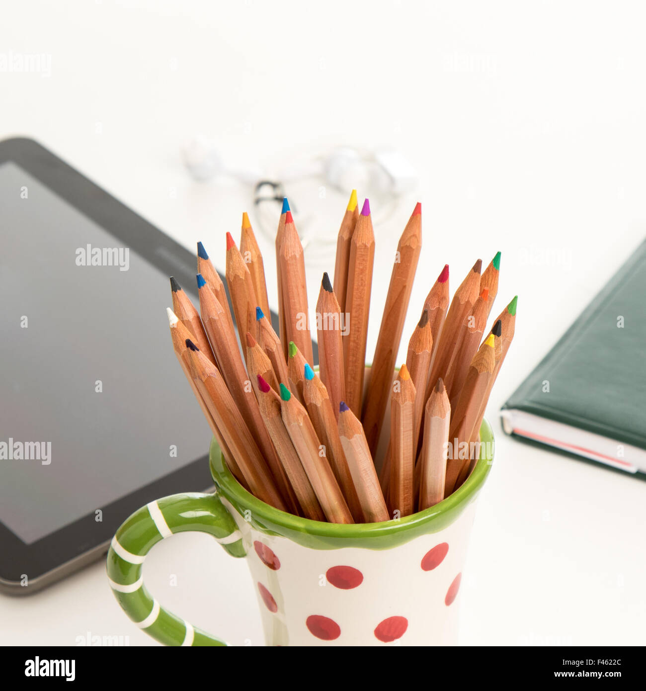 Color pencils in a mug Stock Photo - Alamy