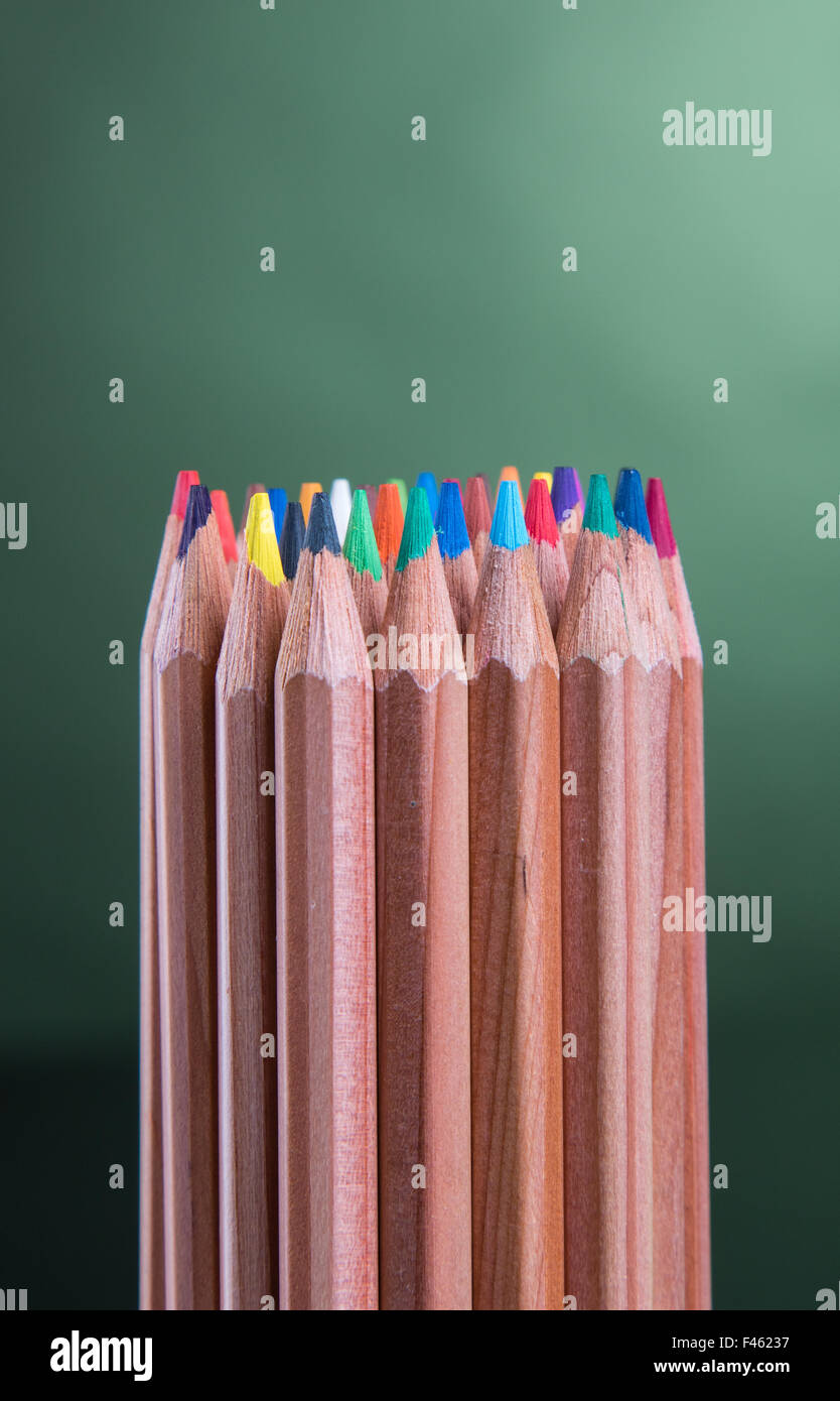 color pencils with green background Stock Photo - Alamy