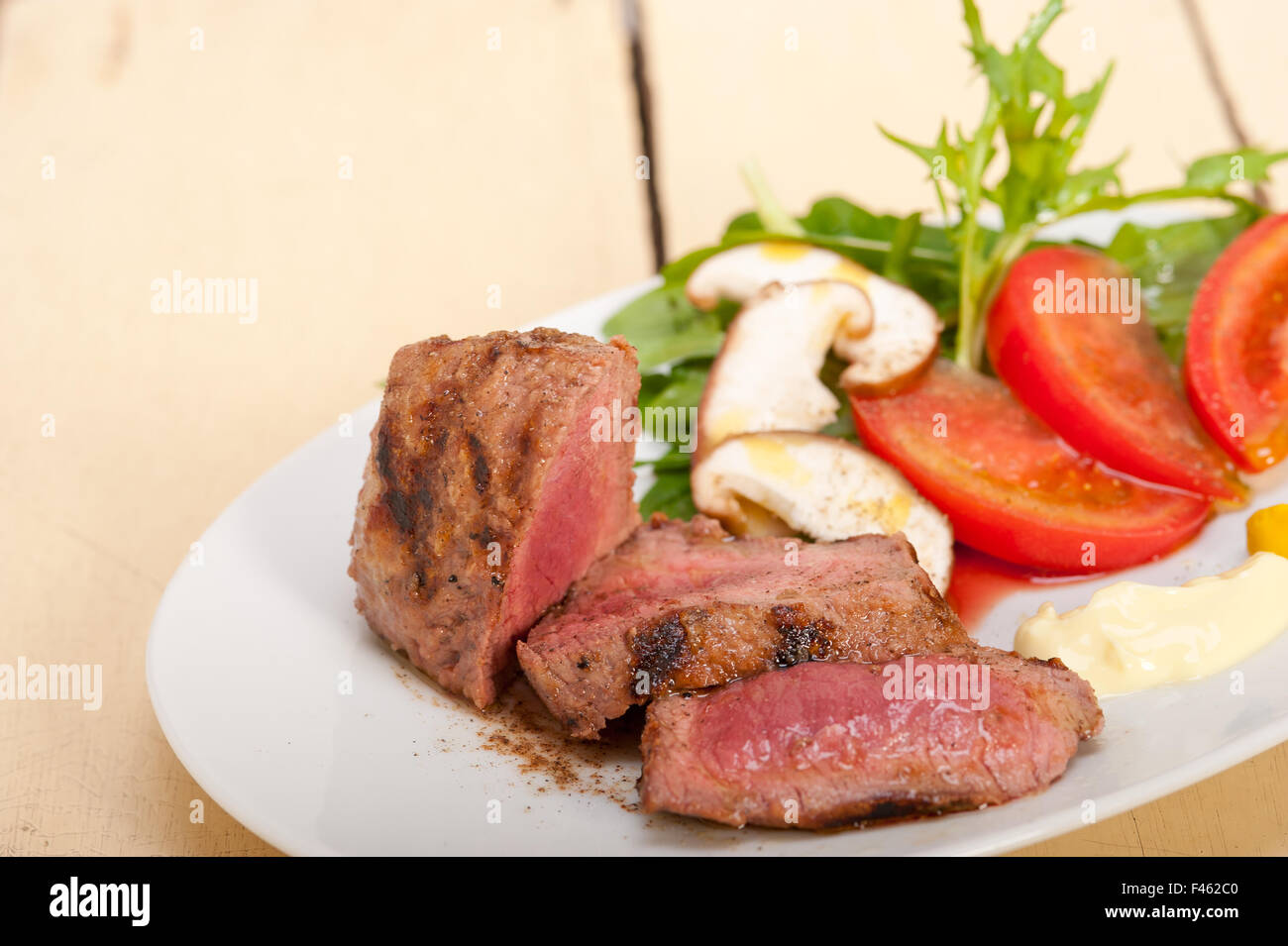 beef filet mignon grilled with vegetables Stock Photo - Alamy