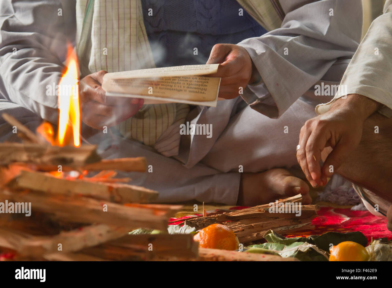 Hindu brahman reading mantra during nepali puja Stock Photo - Alamy