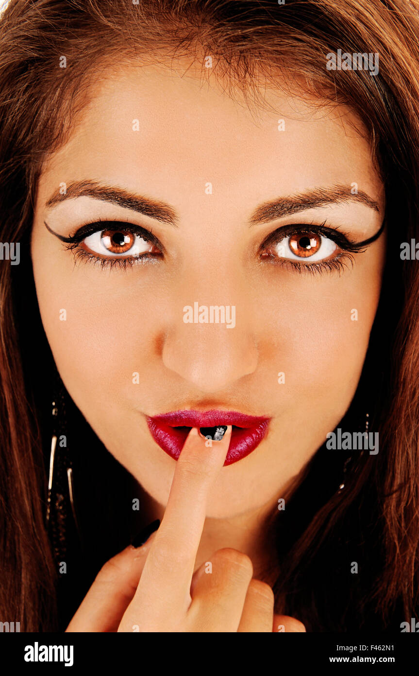 Finger in mouth Stock Photo - Alamy