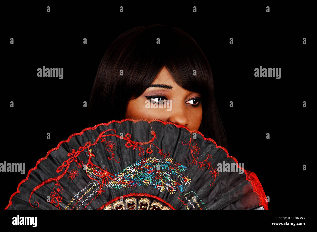 Young woman behind fan hi-res stock photography and images - Alamy