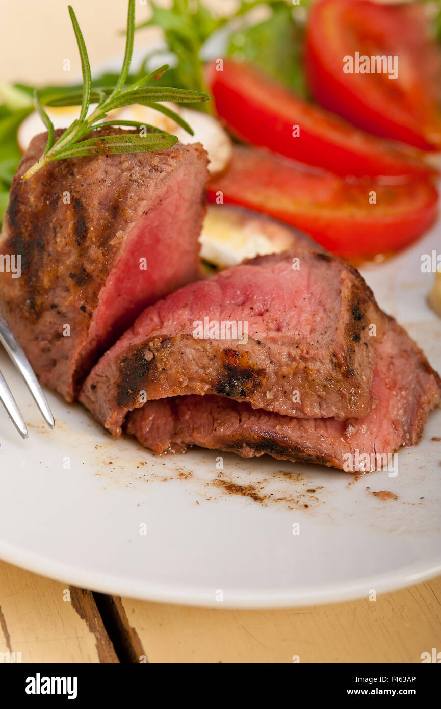 beef filet mignon grilled with vegetables Stock Photo - Alamy