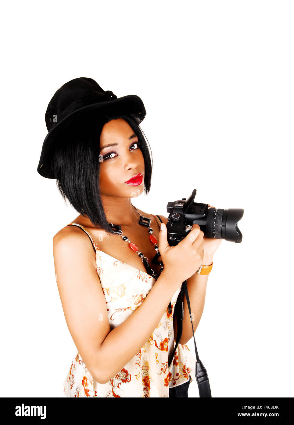 Pretty girl with camera Stock Photo - Alamy