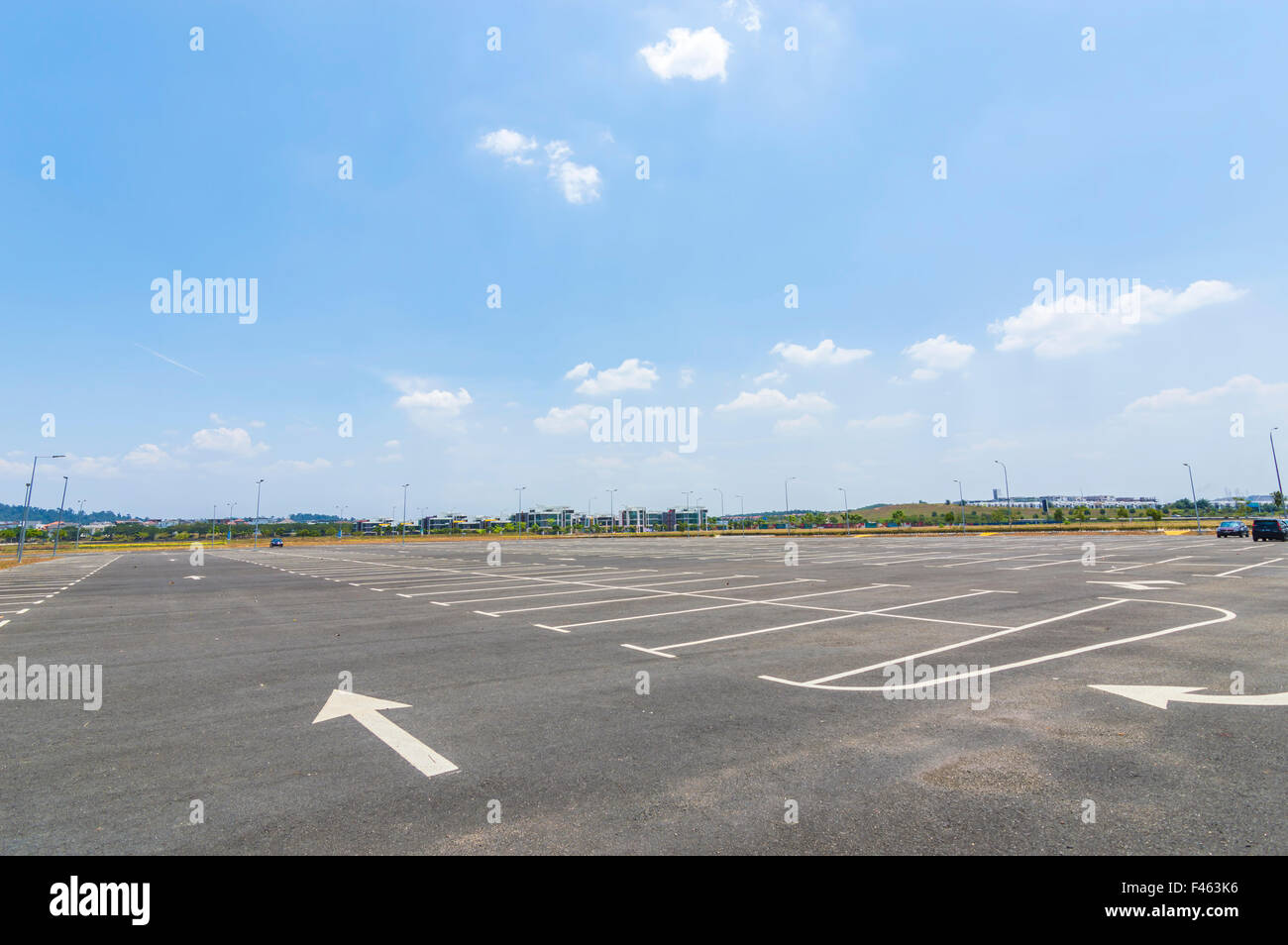 Empty parking lot with blue skies Stock Photo - Alamy