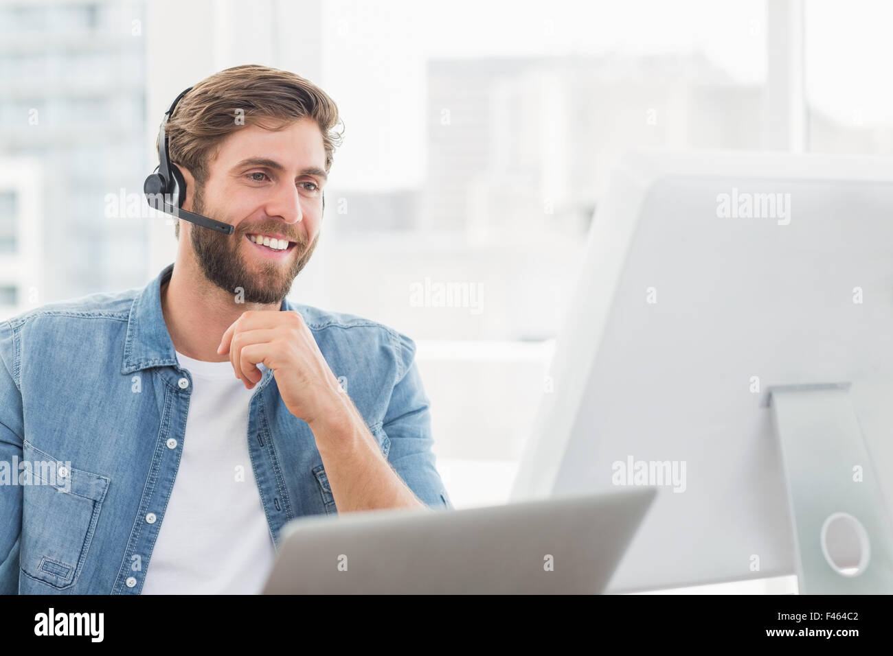 Happy operator earpiece hi-res stock photography and images - Alamy