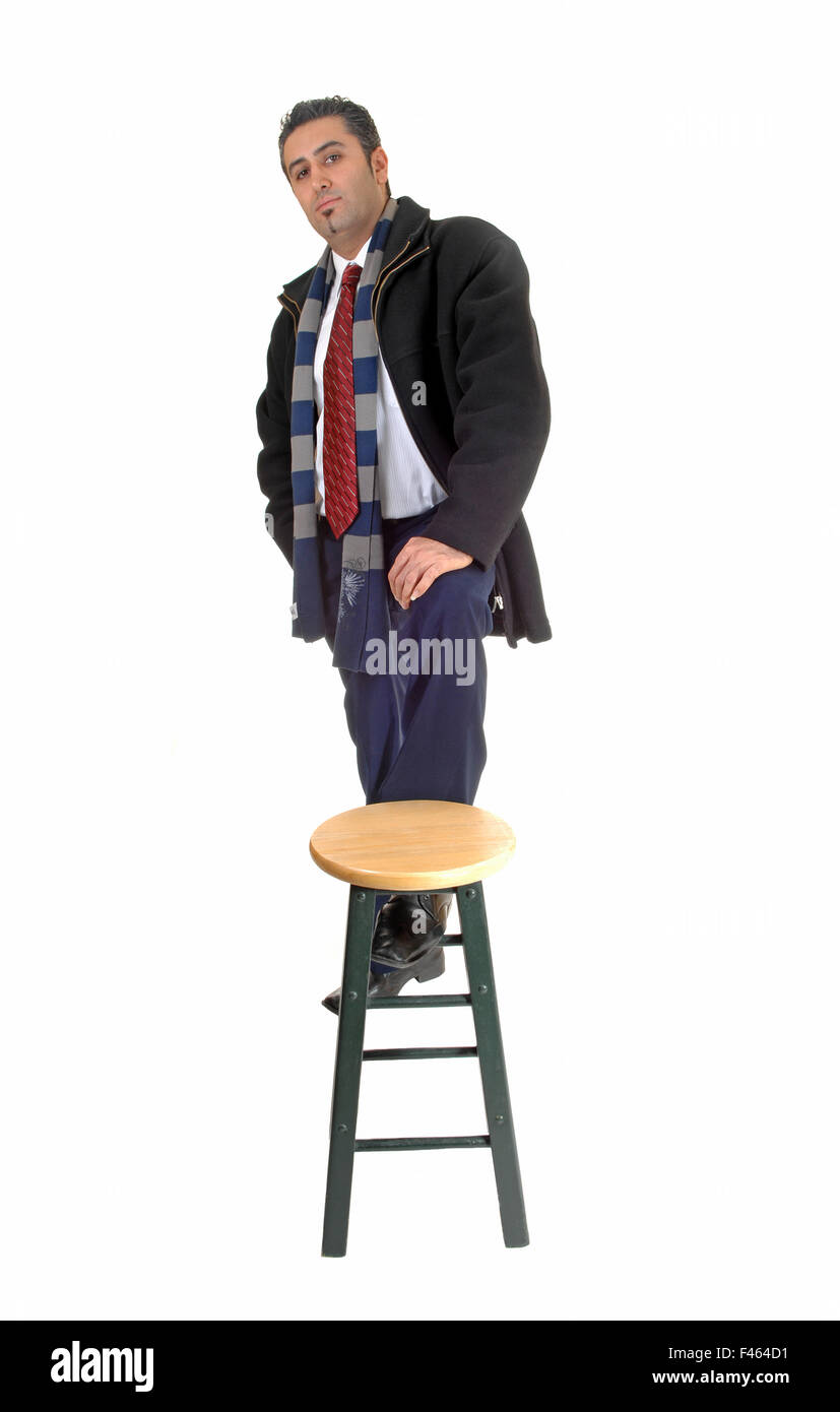 Stylish young man standing chair hi-res stock photography and images ...