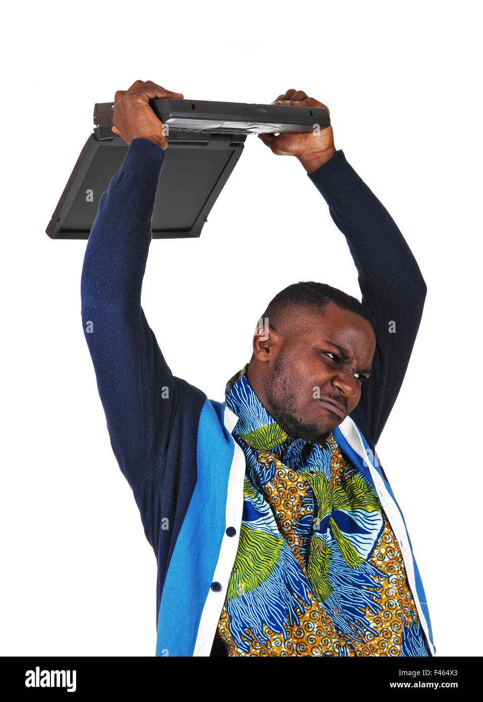 Black man throwing his laptop Stock Photo - Alamy