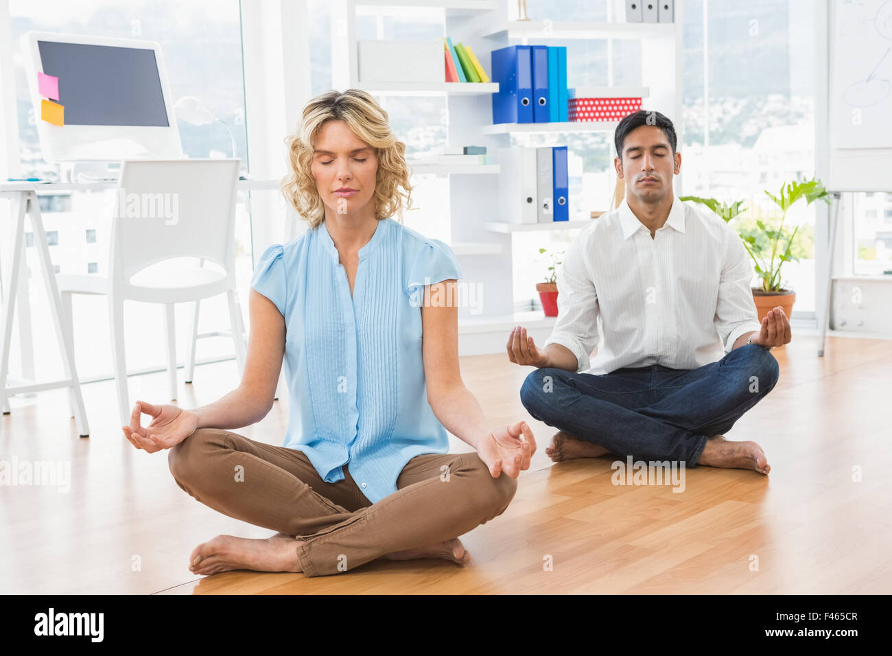 Young business people mediating Stock Photo - Alamy