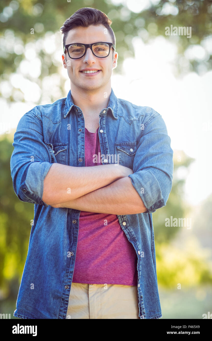 Handsome hipster smiling at camera Stock Photo - Alamy