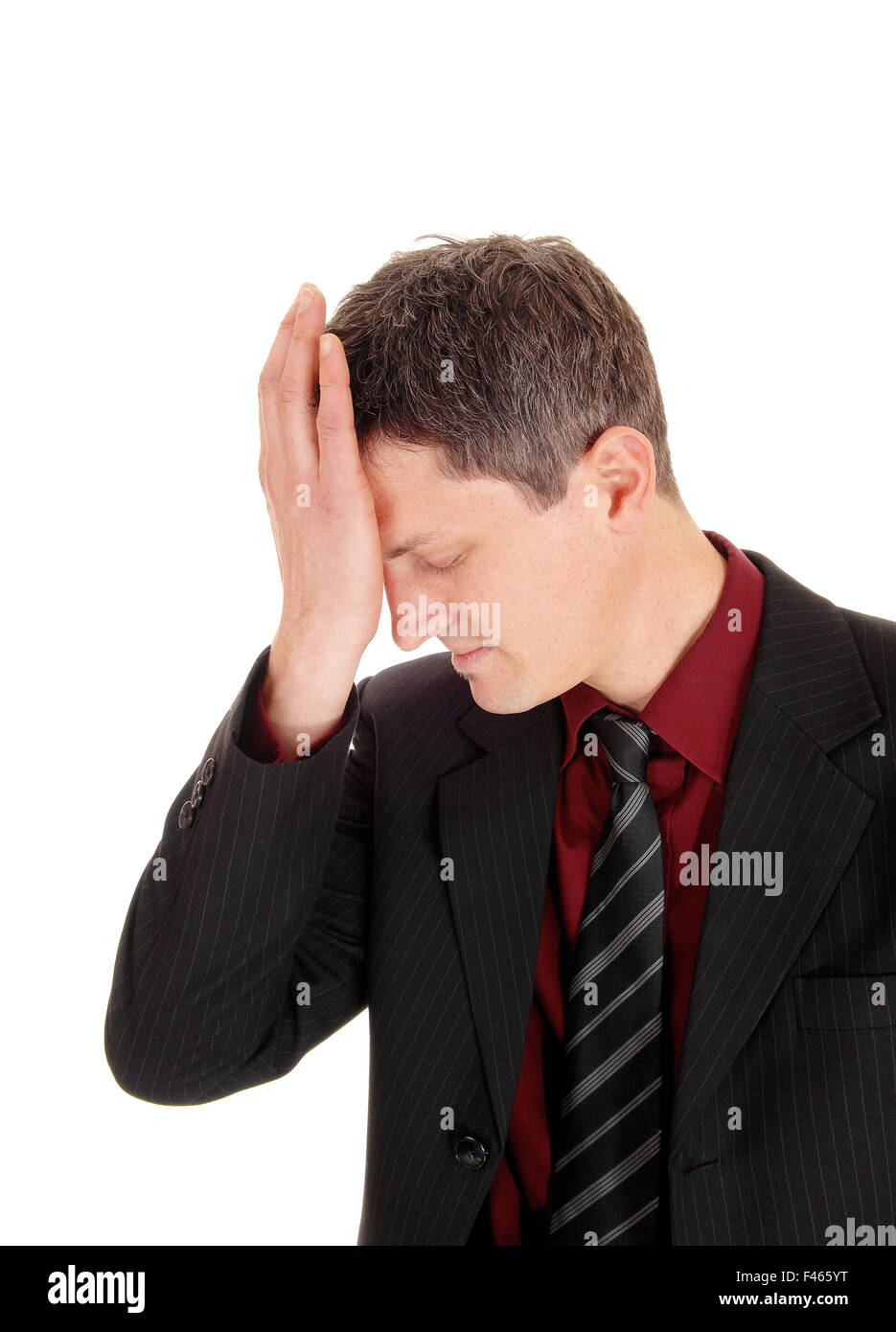 Man with hand on forehead Stock Photo - Alamy