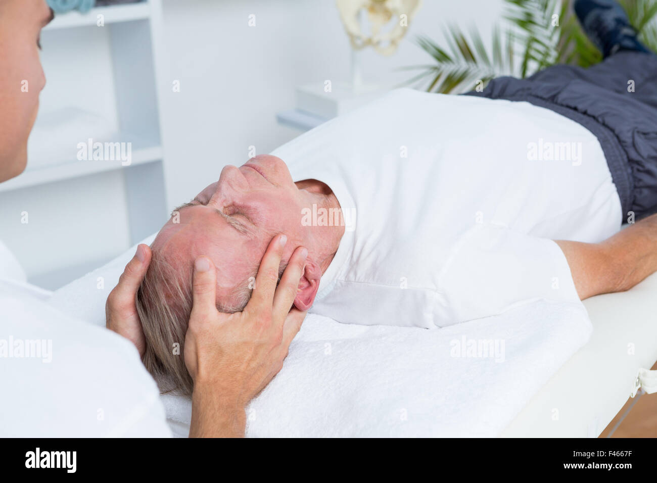 Man receiving head massage Stock Photo - Alamy