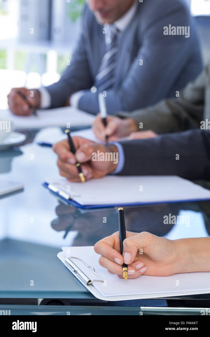 Business team redacting contracts Stock Photo - Alamy