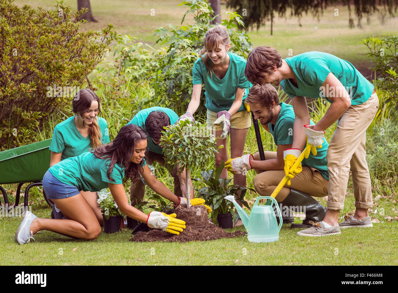 Happy friends gardening hi-res stock photography and images - Alamy