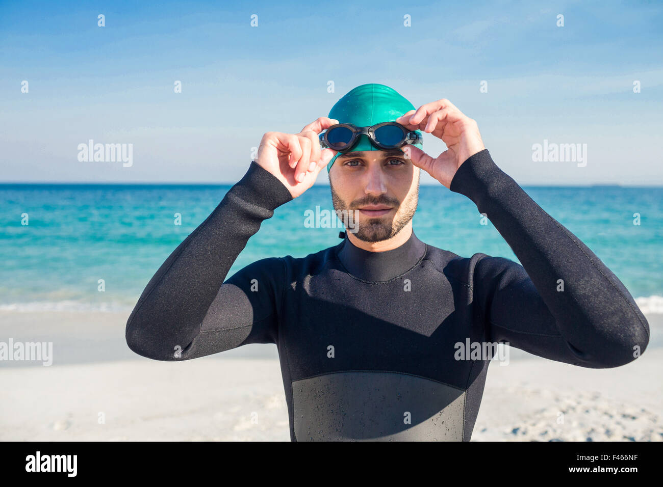 Swimmer getting ready at the beach Stock Photo - Alamy