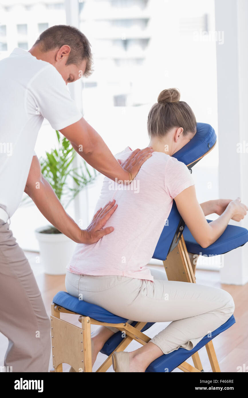 Woman having back massage Stock Photo - Alamy