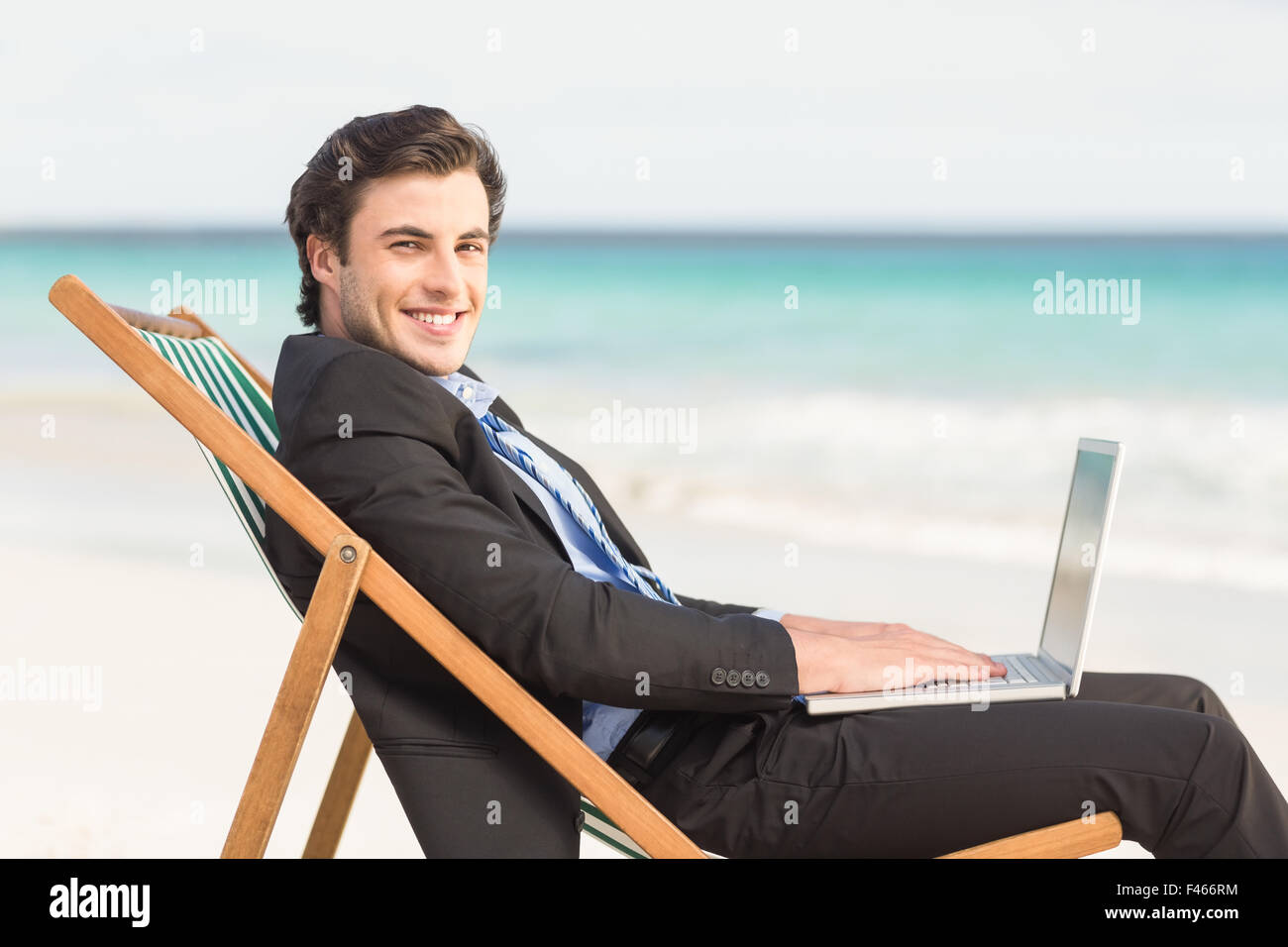 Businessman using his laptop Stock Photo - Alamy Businessman using his laptop Stock Photo - Alamy