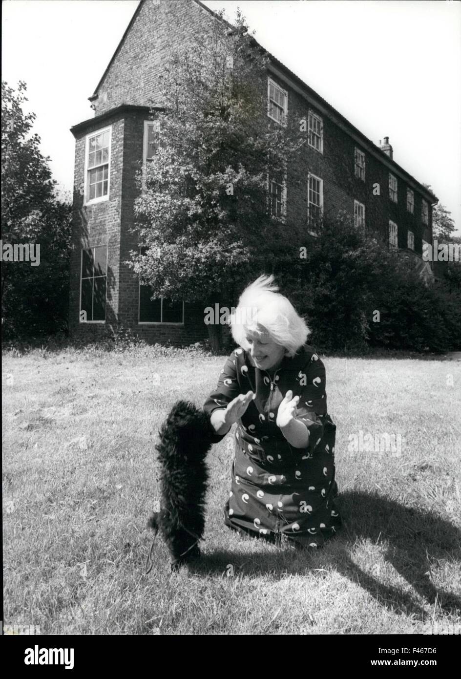 Feb. 24, 1962 - Miss Wagner having fun and games with her pet poodle ...