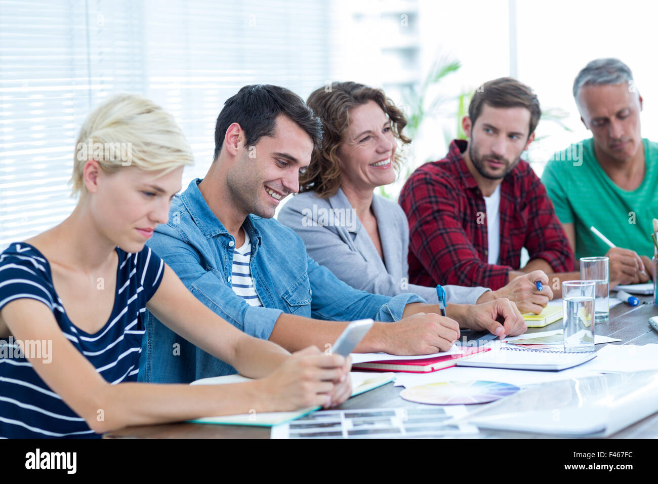 Creative business people in meeting Stock Photo - Alamy