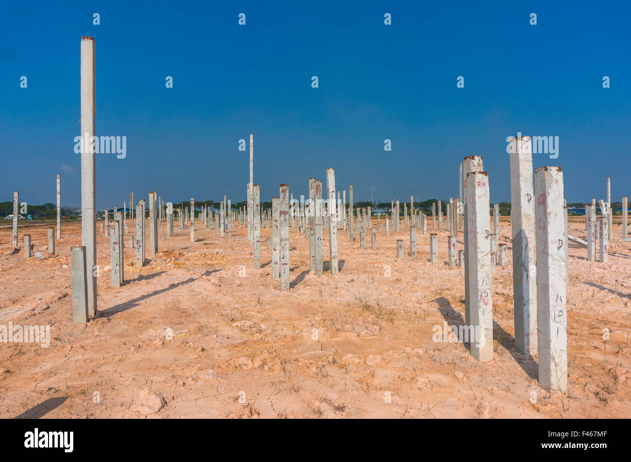 Piling work at construction site with blue skies background Stock Photo ...