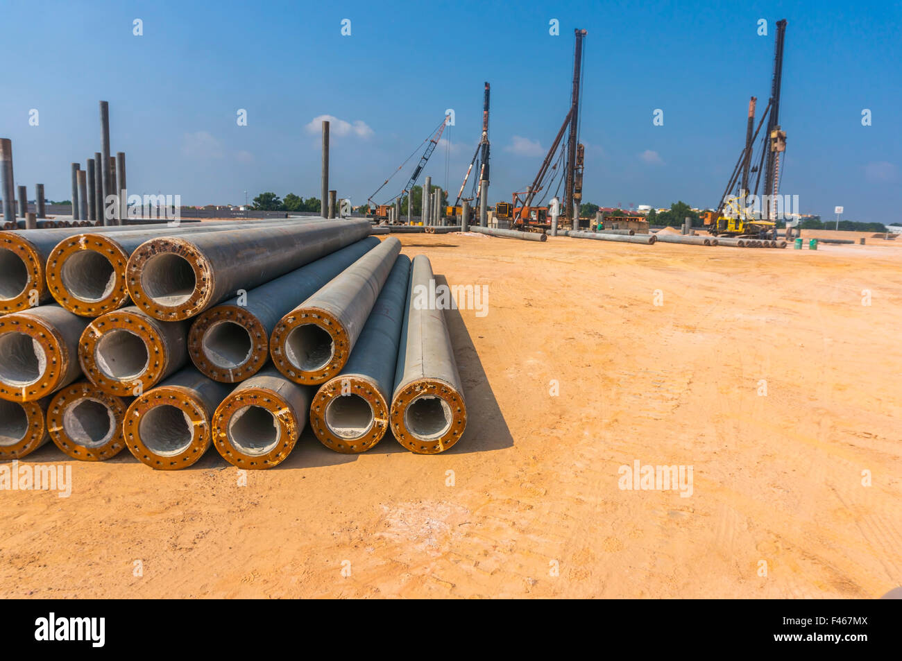 Piling work at construction site with blue skies background Stock Photo ...