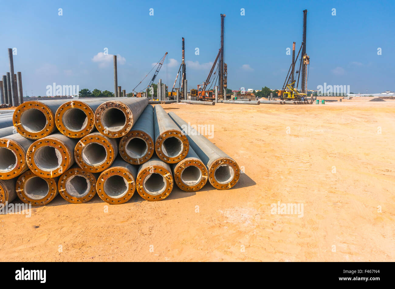 Piling work at construction site with blue skies background Stock Photo ...