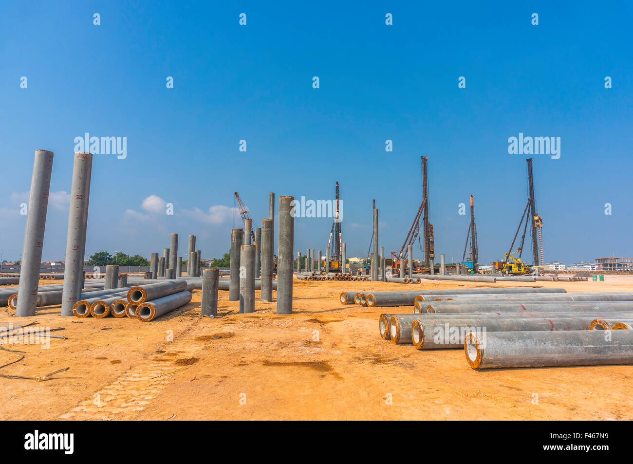 Piling work at construction site with blue skies background Stock Photo ...