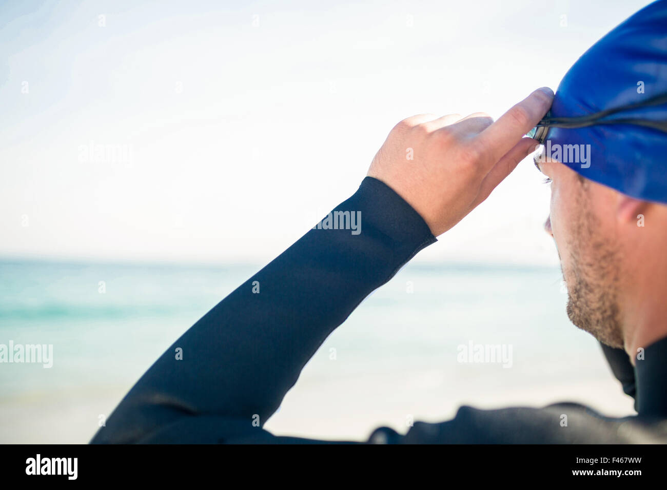 Swimmer getting ready at the beach Stock Photo - Alamy