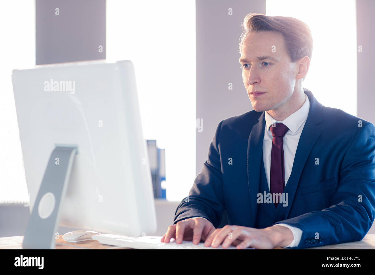 Serious typing hi-res stock photography and images - Alamy